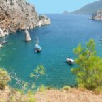 Kemer Porto Genoese-Sazak Bays Boat Trip With Mud Baths - Sazak Bay: Natural Serenity and Snorkeling