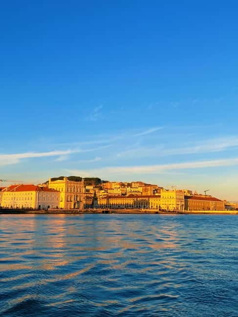 Lisbon Sailing Boat Tour: Beach Stop with snacks and drinks - What to Expect During the Experience