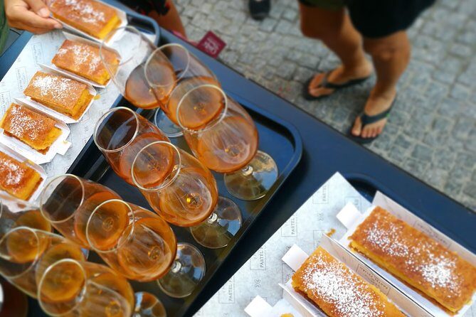 Lisbon Small-Group Food Tour with 18 Tastings in Alfama District - Exploring Alfama: The Heart of Lisbon