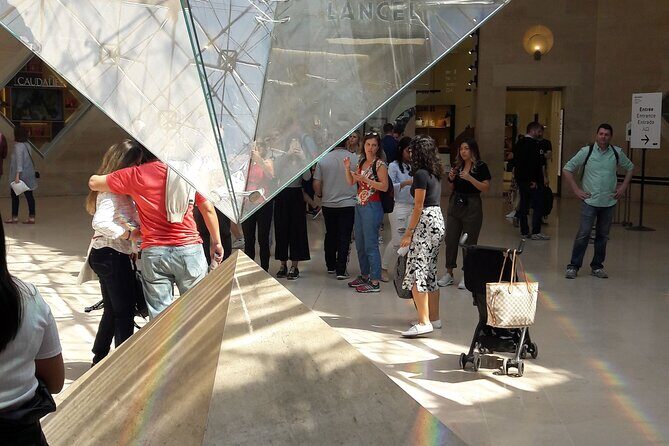 Louvre Museum Timed Entry Ticket with Audio Guide in 4 languages - Navigating the Museum on Your Terms