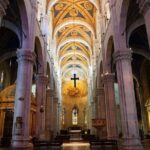 Lucca: Walking tour to discover the city of 100 churches - Via Fillungo and the Legend of the Clock Tower
