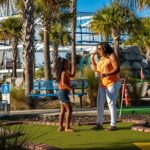 Mini Golf beneath SkyWheel Panama City Beach - Overview of the Experience