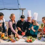 Paella Cooking Experience & Winery Tour from Barcelona - Wine Tasting: Four Wines and a Scenic Setting