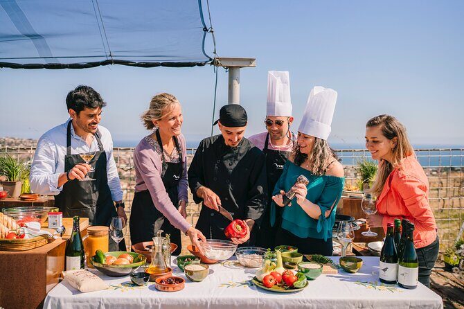 Paella Cooking Experience & Winery Tour from Barcelona - Wine Tasting: Four Wines and a Scenic Setting