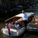 Private Guided Historic Amsterdam Canal Cruise in a Salon Boat - Practical Tips for Your Cruise