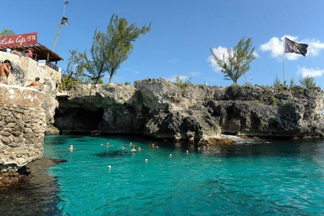 Ricks Cafe Sunset Catamaran & Snorkeling Negril and Montego Bay - Snorkeling at Sandy Cove Reef: A Highlight