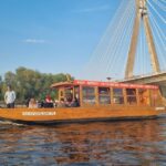 Warsaw: Evening Vistula Cruise with Welcome Drink - The Atmosphere & Experience