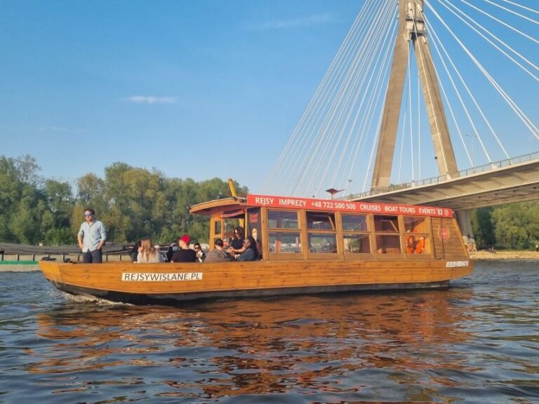 Warsaw: Evening Vistula Cruise with Welcome Drink - The Atmosphere & Experience
