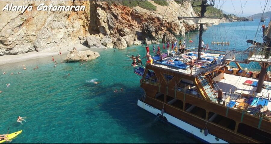 Alanya Catamaran Boat Trip with Swim Stops & Sunbathing - The Sea Caves: Pirates, Lovers, and Phosphorus