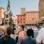 Bologna Walking tour with Tower Sky View and Archiginnasio - Exploring Historical Sites: The Archiginnasio and Anatomical Theater
