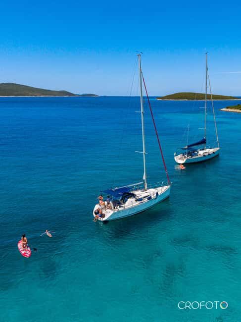 Elegant Yacht Sailing-Half-Day of Pure Bliss - A Private Beach Experience