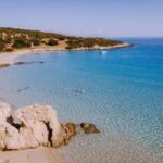 From Heraklion: Voulisma Beach Day Trip with Hotel Transfer - The Beach Experience: Sun, Swim, and Local Flavor