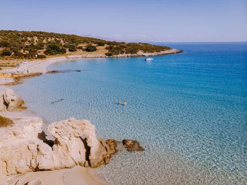 From Heraklion: Voulisma Beach Day Trip with Hotel Transfer - The Beach Experience: Sun, Swim, and Local Flavor