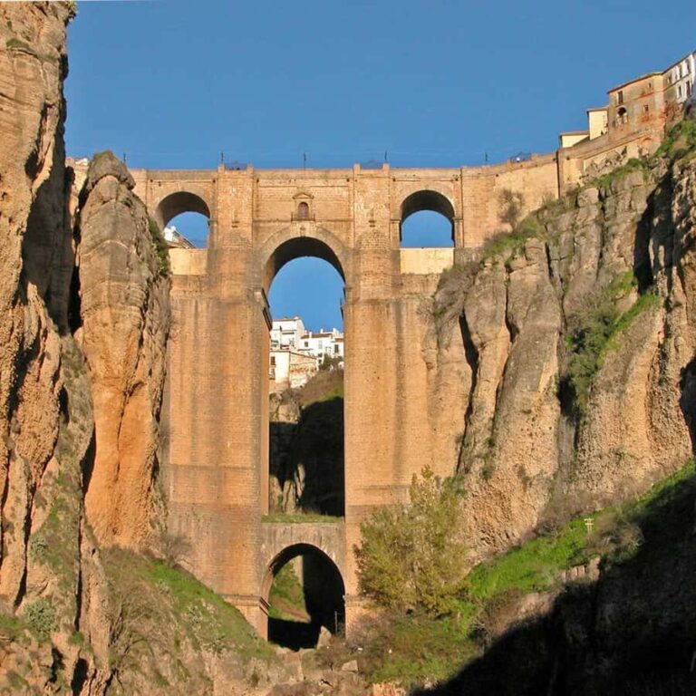 From Seville: Day trip to the White Villages and Ronda - Setenil de las Bodegas: Walking Through a Living Cave Town