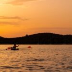 Golfo Aranci: traditional or transparent kayaks, dolphins, and aperitif - Discovering Golfo Aranci’s Coastline
