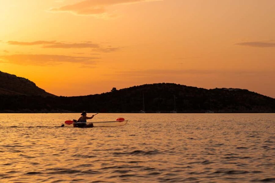Golfo Aranci: traditional or transparent kayaks, dolphins, and aperitif - Discovering Golfo Aranci’s Coastline