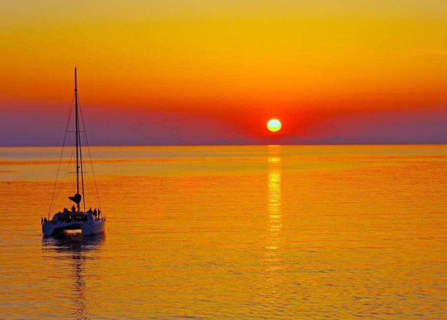 Rhodes: Sunset Catamaran Cruise with Dinner, Drinks & Swim - Key Points