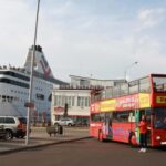 Riga: Red Bus Hop-On Hop-off Sightseeing Grand Tour - Authentic Traveler Insights