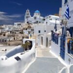 Santorini: Oia Walking Tour and Lighthouse Sunset with Wine - Exploring the Itinerary: From Oia’s Cliffs to Lighthouse Sunsets