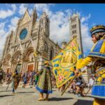 Siena: Contrade Walking Tour with Contrada Museum Entry - The Museum Experience: Artifacts and Sacred Traditions