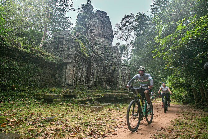 Angkor Sunrise Bike Tour with Breakfast and Lunch Included - Exploring the Temples: A Closer Look at the Itinerary
