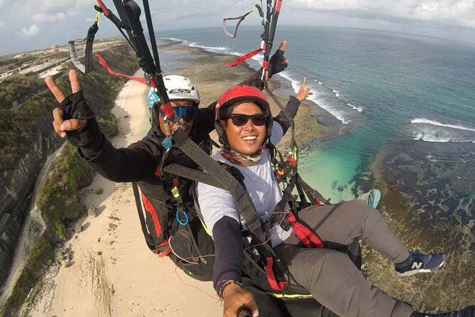 BALI PARAGLIDING Fly, Swing and Soaring above the sea with private transfer - The Landing and Post-Flight Experience