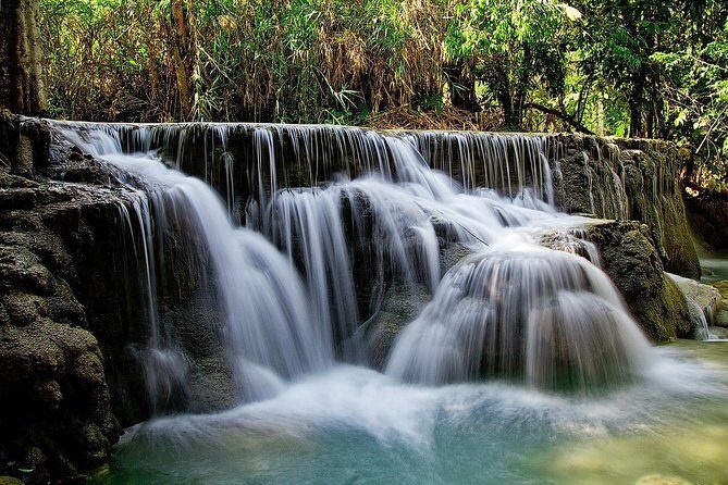 Bangkok Damnoen Saduak Floating Market and Erawan Waterfall (minimum 2 pax) - The Natural Wonder of Erawan Waterfalls
