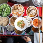 Bangkok: Railway & Damnoen Saduak Floating Market with Transfer - The Mae Klong Railway Market: A Live Action Spectacle