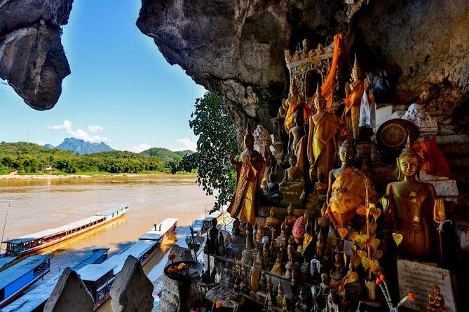 Bike to Pak Ou Caves and boat trip back to Luang Prabang City full day - The Majestic Pak Ou Caves