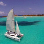 Catamaran party Isla Mujeres with drinks & lunch - Snorkeling in the Caribbean Waters