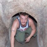 Cu Chi Tunnels half day luxury group tour depart from Sai Gon - Overgrown Craters and Rice Fields