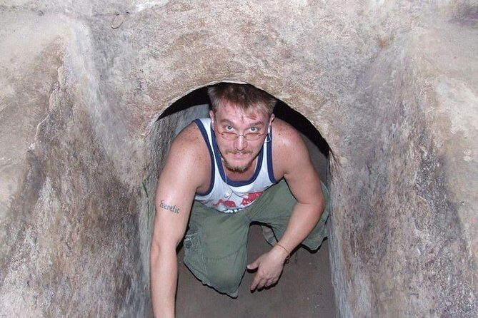 Cu Chi Tunnels half day luxury group tour depart from Sai Gon - Overgrown Craters and Rice Fields