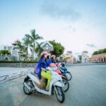 Danang Night City Tour with Aodai Lady Rider & Han River Cruise - Love Bridge and APEC Park