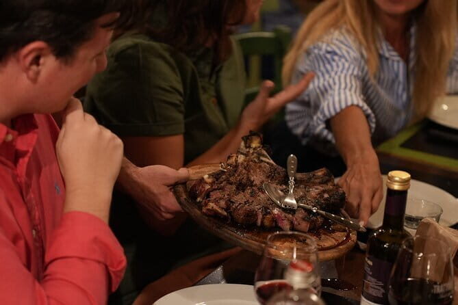 Florence Evening Food Tour with Florentine Steak & Tuscan Wine - Crossing the Arno: Ponte Vecchio & The Oltrarno District