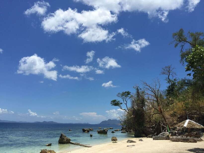 From Coron: Twin Lagoon and Skeleton Wreck Cruise with Lunch - Visiting Malcapuya Island & Other Beaches