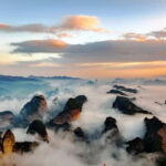From Guilin: Danxia Peaks & Guangxi-Hunan Tribal Trails Tour - Exploring the Dragon Head Peak – a daring lookout
