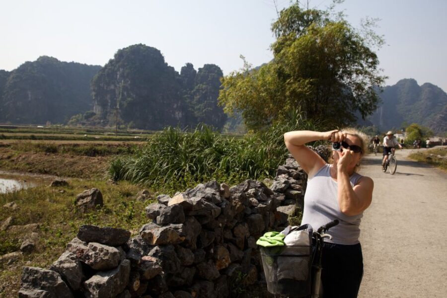 From Hanoi: Hoa Lu & Tam Coc with Buffet lunch & Cycling - Tam Coc Boat Cruise: Gliding Through Limestone Caves