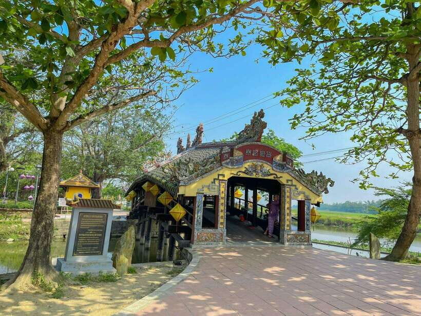 From Hue: Hoi An Guided Bus Tour with 4 Scenic Stops - Transportation and Guide Experience