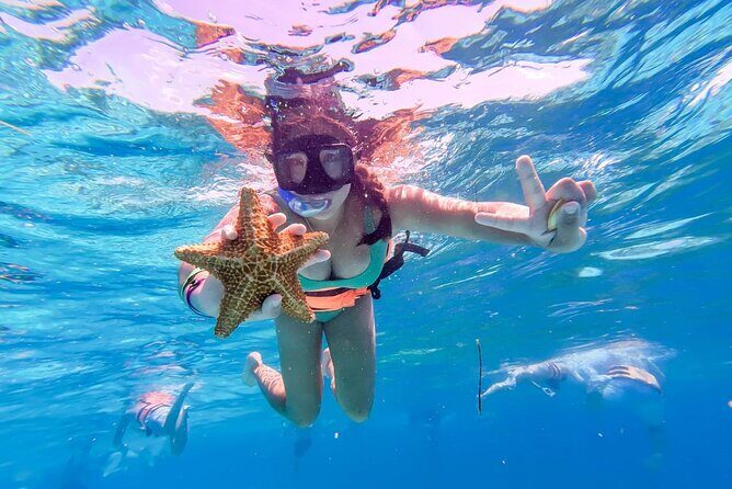 Fun Catamaran Excursion to Isla Mujeres with Unlimited drinks! - Exploring Isla Mujeres