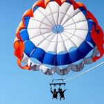 Half Day Parasailing and Uluwatu Temple Tour in Bali - Transportation and Group Dynamics