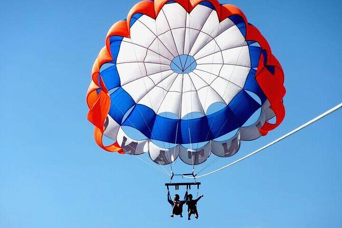 Half Day Parasailing and Uluwatu Temple Tour in Bali - Transportation and Group Dynamics