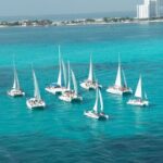 Isla Mujeres Catamaran Snorkeling, Beach Club Lunch and Open bar - Snorkeling at Arrecife El Meco