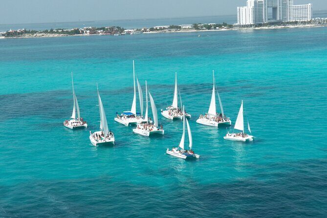 Isla Mujeres Catamaran Snorkeling, Beach Club Lunch and Open bar - Snorkeling at Arrecife El Meco