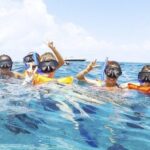 Isla Mujeres Catamaran Tour with Snorkel, Open bar and Transport - Itinerary Breakdown