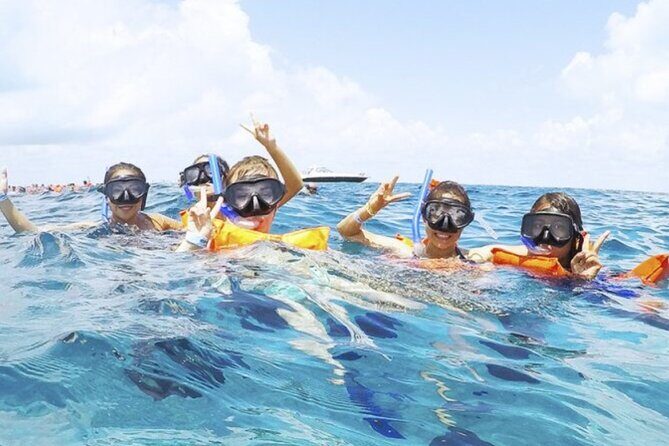 Isla Mujeres Catamaran Tour with Snorkel, Open bar and Transport - Itinerary Breakdown