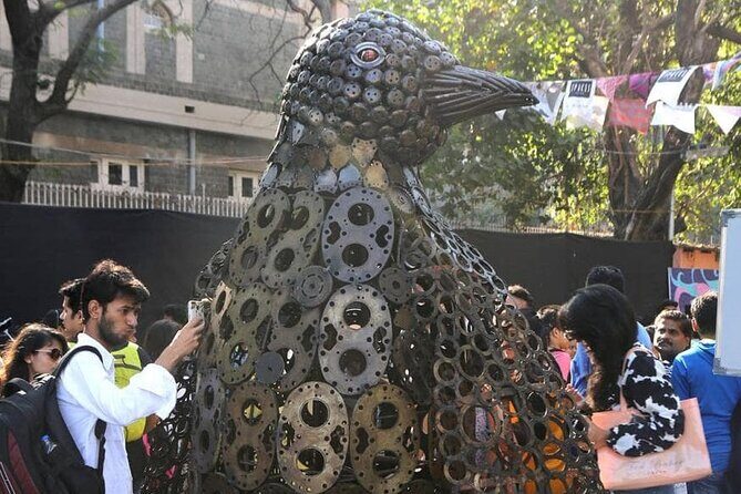 Kanheri Caves, Crawford Market, and Kala Ghoda Art District Tour - Visiting Dharavi: A Cultural and Economic Microcosm