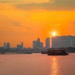 Phnom Penh Sunset Cruise & Evening City Tour Vespa Adventure - Key Points