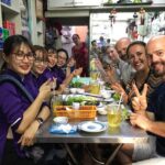 Private Ho Chi Minh Street Food Tour by Motorbike with Ao Dai Female Rider - Key Points