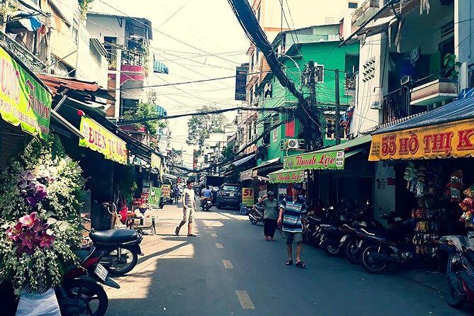 Saigon Afternoon Unseen Street Food by Scooter |Opt: Ao Dai Rider - Vibrant Ho Thi Ky Flower Market