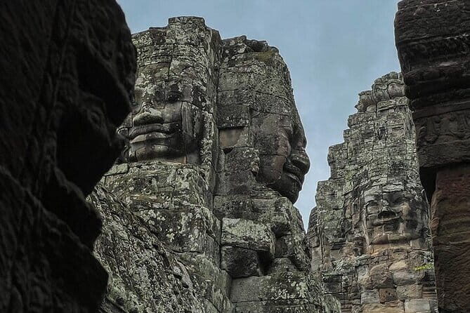 Sunrise Angkor Wat Temple Half Day Tour (Join-In) by Minivan - Exploring the Bayon Temple in Depth
